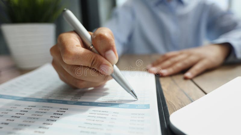 Woman in the Office Looking through Paper Documents Stock Image - Image ...