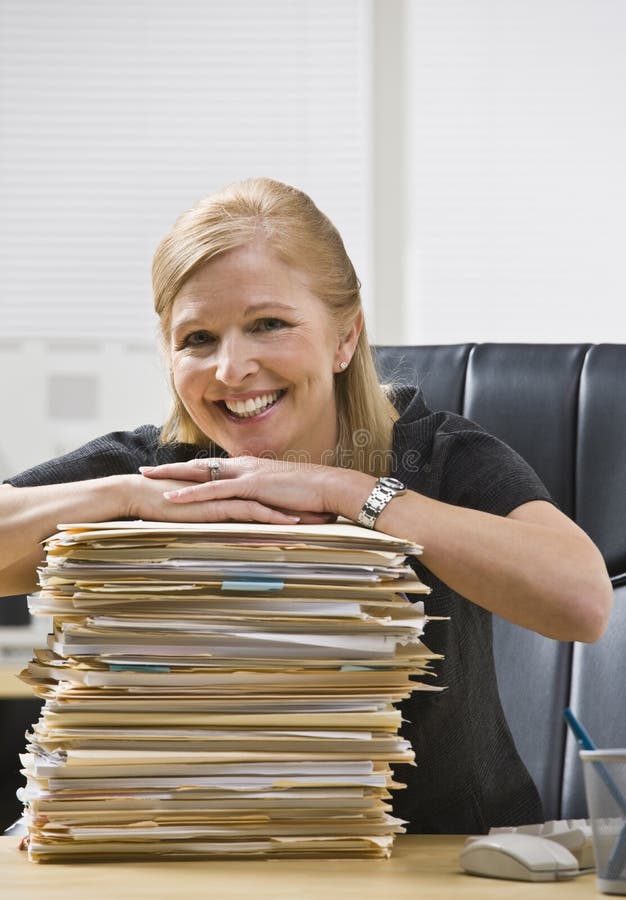 Woman in Office with Paperwork Stock Photo - Image of lawyer, files ...