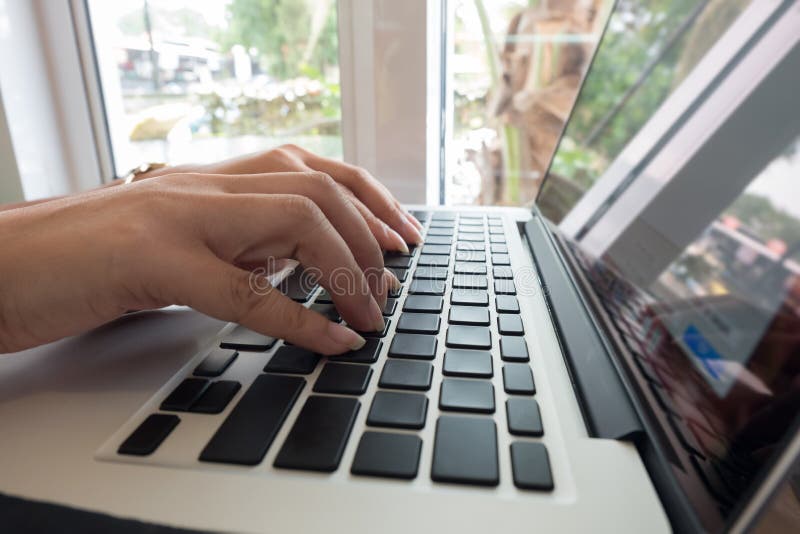 Woman Office Worker Typing on a Keyboard of Laptop Stock Photo - Image ...