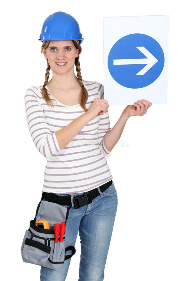 Woman with a one way sign stock photo. Image of woman - 27812366