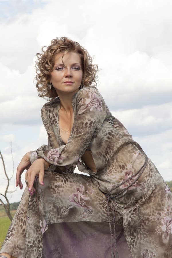 Woman in an open dress stock image. Image of elegant - 26765845