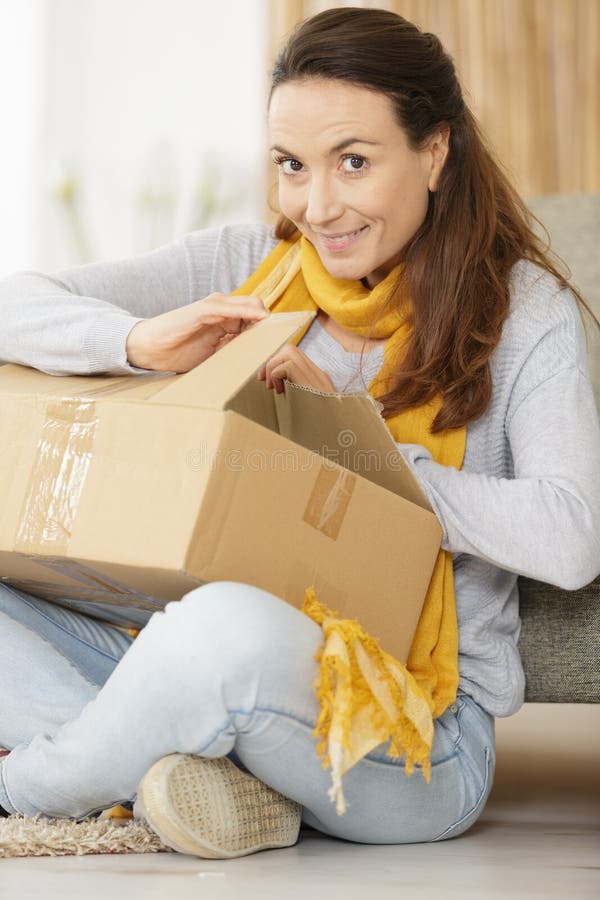 Woman opening box stock photo. Image of package, move - 266720948