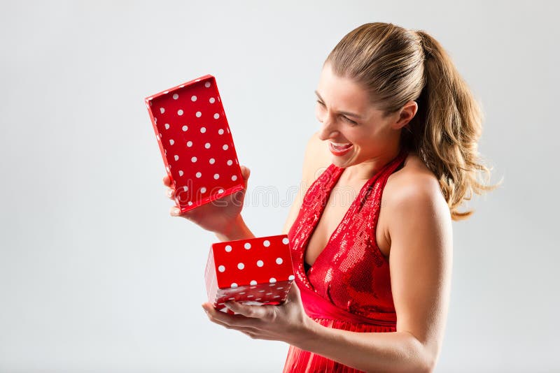 Woman Opening the Gift and is Happy Stock Image - Image of ...