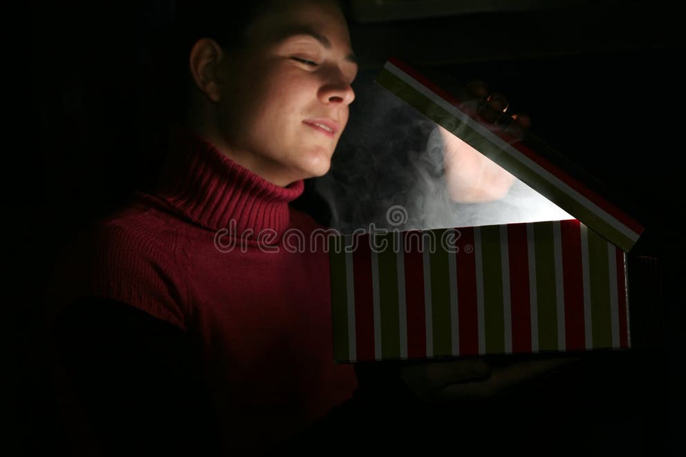 Woman Opening Magic Present Stock Photo - Image of people, expression ...