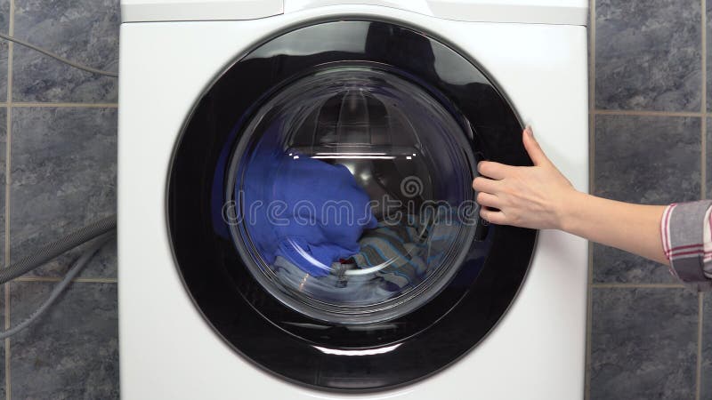 Woman Opens a Washing Machine Stock Image - Image of cleaning ...