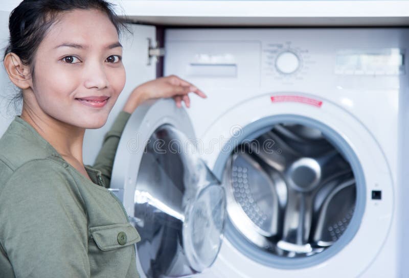 Woman Opens Washing Machine Stock Photo - Image of domestic, housework ...