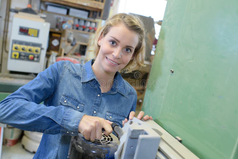 Woman Operating Grab Machine Stock Photo - Image of industry, yard ...