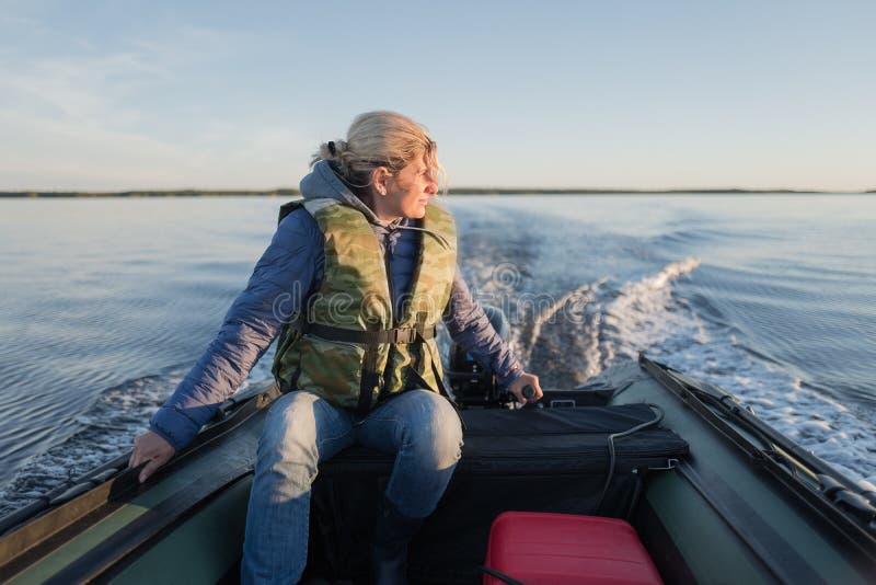 Woman is Operating of Boat on the Sea Stock Photo - Image of hair, hero ...