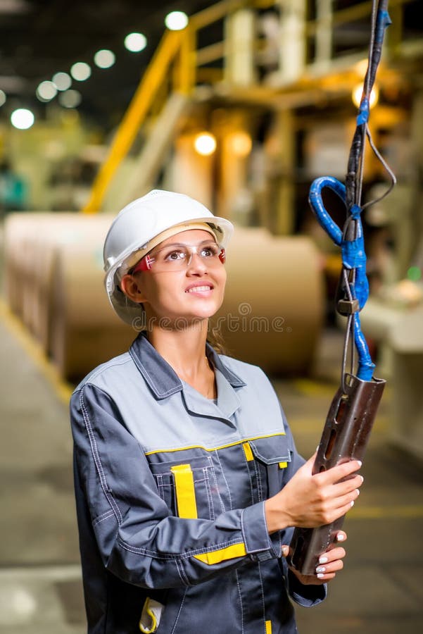 Woman operating crane stock photo. Image of industry - 92877704