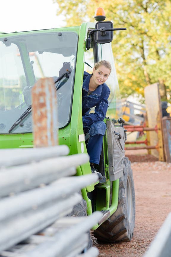Woman Operating Telehandler Stock Photo - Image of duty, operator ...