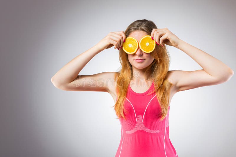 Woman with Orange Slices - Neutral Face Stock Image - Image of clothing ...