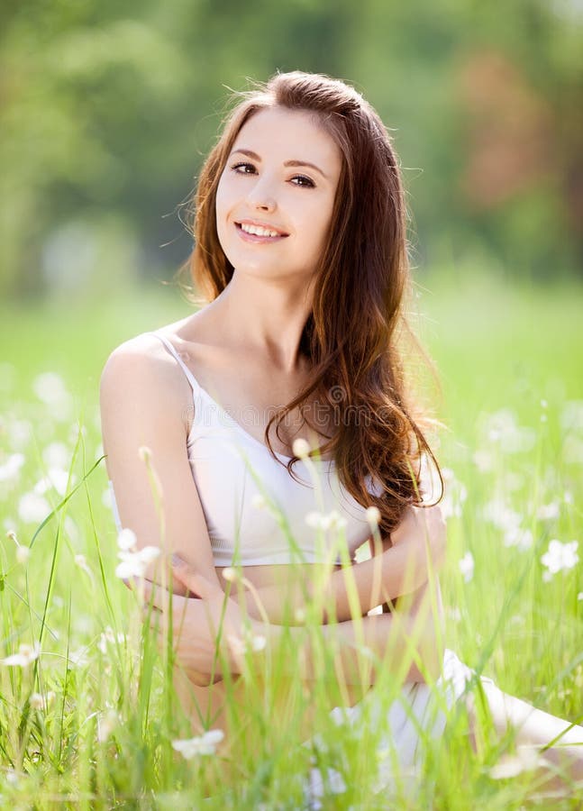 Two Outdoor Photos of a Beautiful Young Woman Wearing White Sportswear ...
