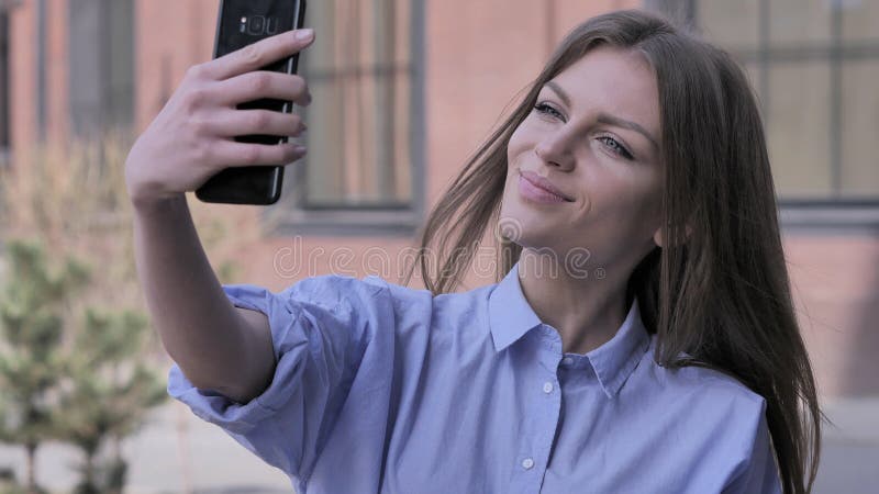 Woman Outside Office Taking Selfie On Smartphone Stock Image Image Of