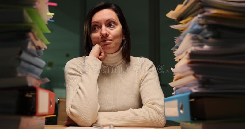 Woman is Overwhelmed with Stack of Papers in Office at Night Stock ...