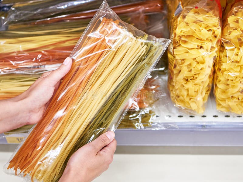 Woman with Package Pasta in Shop Stock Photo - Image of people, pasta ...