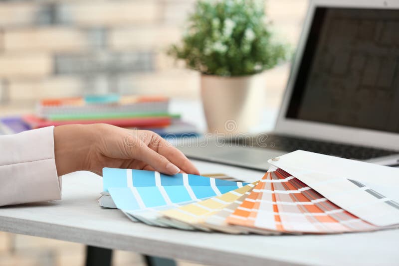 Woman with Paint Color Palette Samples at Table Stock Photo - Image of ...