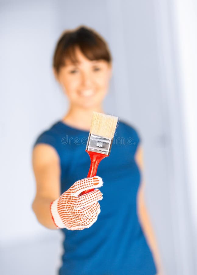 Woman with paintbrush stock image. Image of holding, girl - 37805277