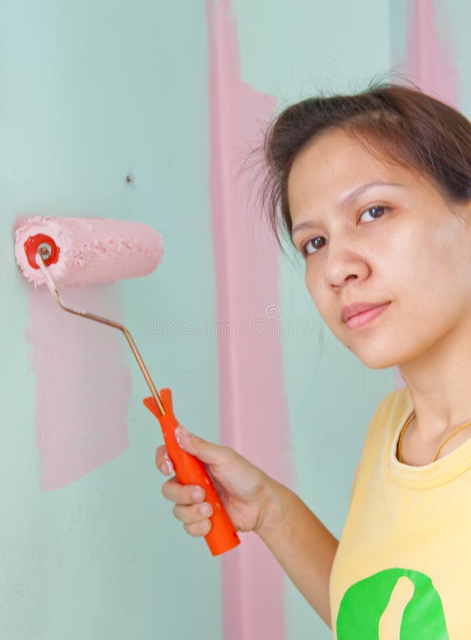 Woman painting wall stock image. Image of people, happy - 36249297