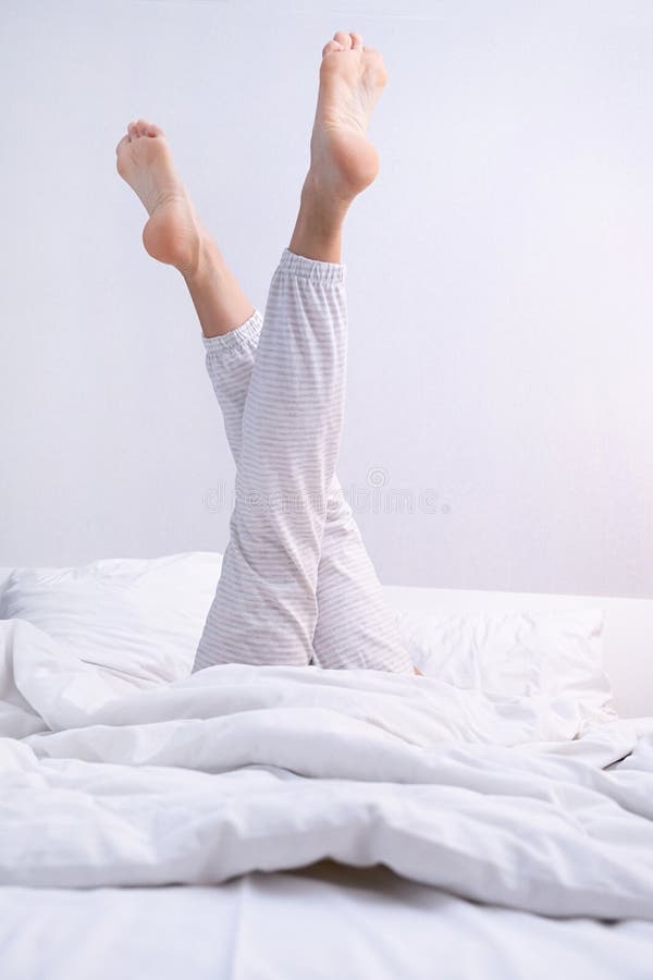 Woman Lying on the Bed with Legs Up Stock Image - Image of beautiful ...
