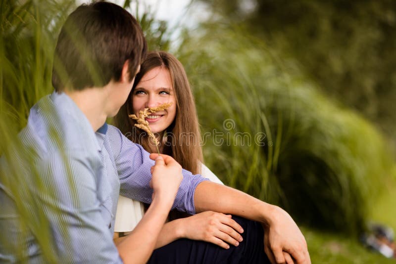 Young Man and Woman Having Fun in Park Stock Photo - Image of people ...