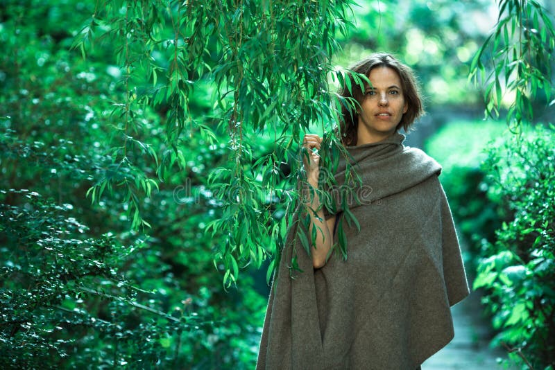 A Woman in the Park among the Green Trees. Stock Photo - Image of model ...
