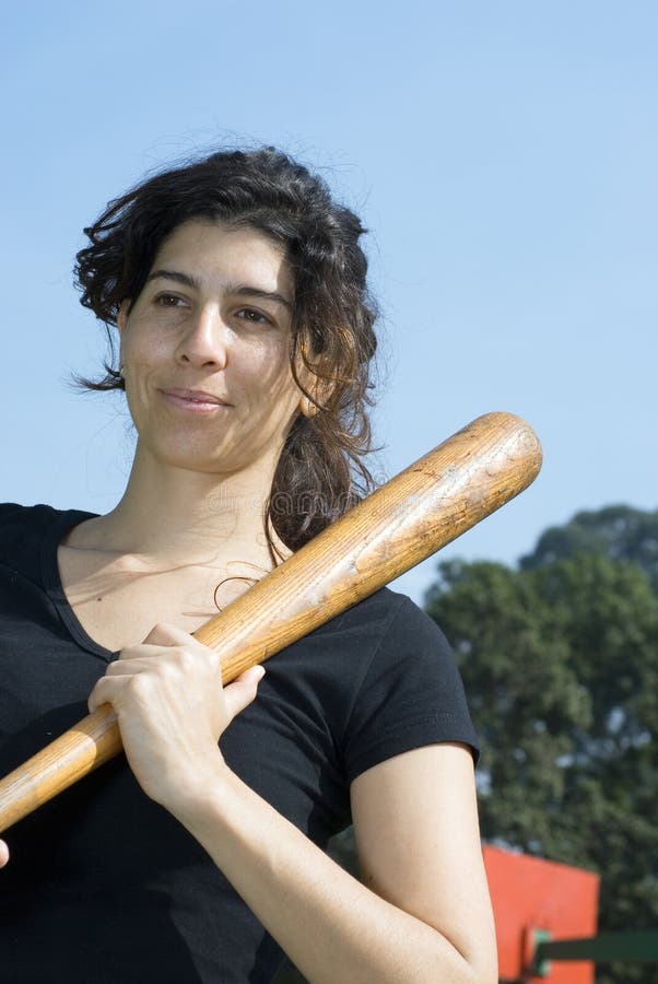 Woman In Park Holding Baseball Bat - Vertical Stock Image - Image of ...