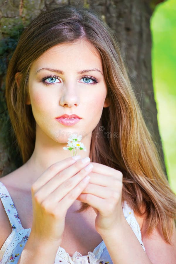 Woman in Park Holding Spring Flowers Stock Image - Image of meadow ...