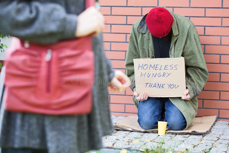 Woman Giving a Coin To Homeless Man Stock Photo - Image of abandoned ...
