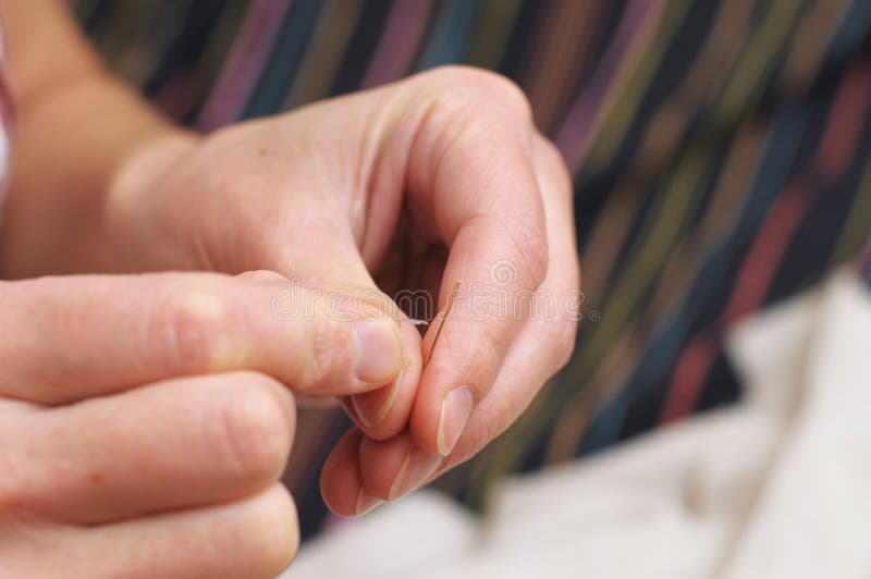 Woman Passing Thread Needle Stock Photos - Free & Royalty-Free Stock ...