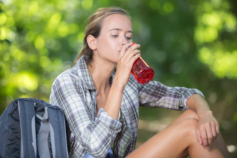 Woman Pausing from Hike To Drink Stock Photo - Image of thirst, trek ...