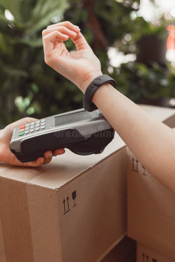 Woman Pay by Smart Watch with NFC Technology Stock Photo - Image of ...