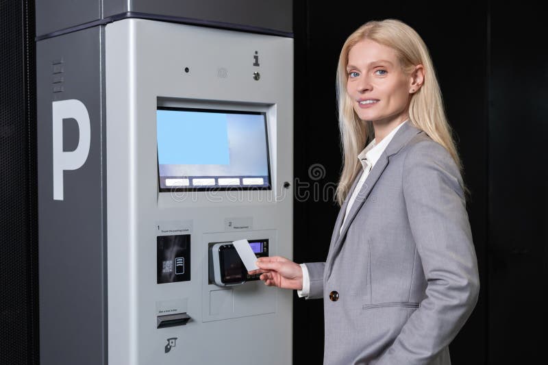 Woman Paying Parking Fee Using Card at Automatic Machine Stock Photo ...