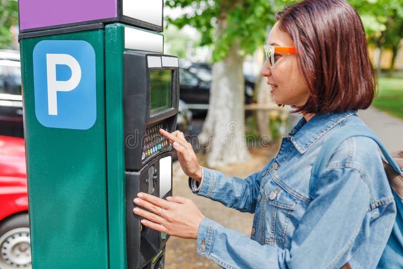Woman Paying at Ticket Machine in a Public Transport Station Stock ...