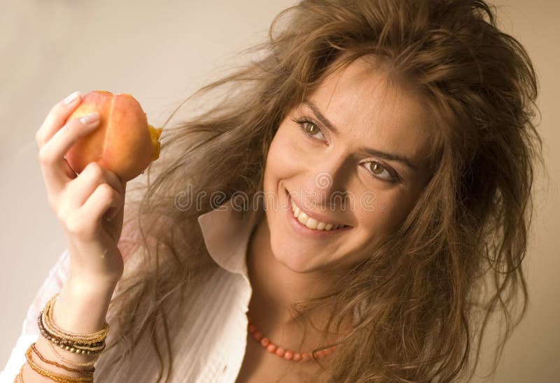 Woman with peach stock image. Image of freshness, nourish - 10931499