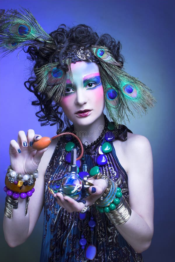 Woman in peacock image. stock photo. Image of gorgeous - 32388430