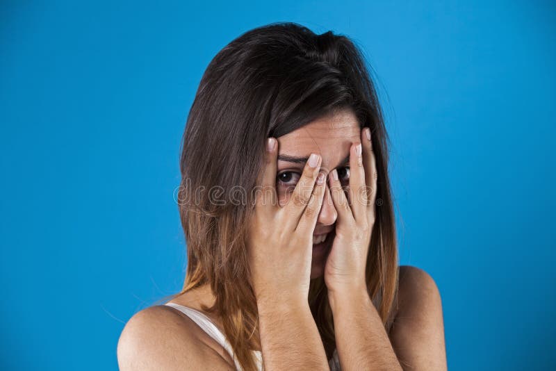 Woman Peeking Behind Her Hands Stock Image - Image of face, headshot ...