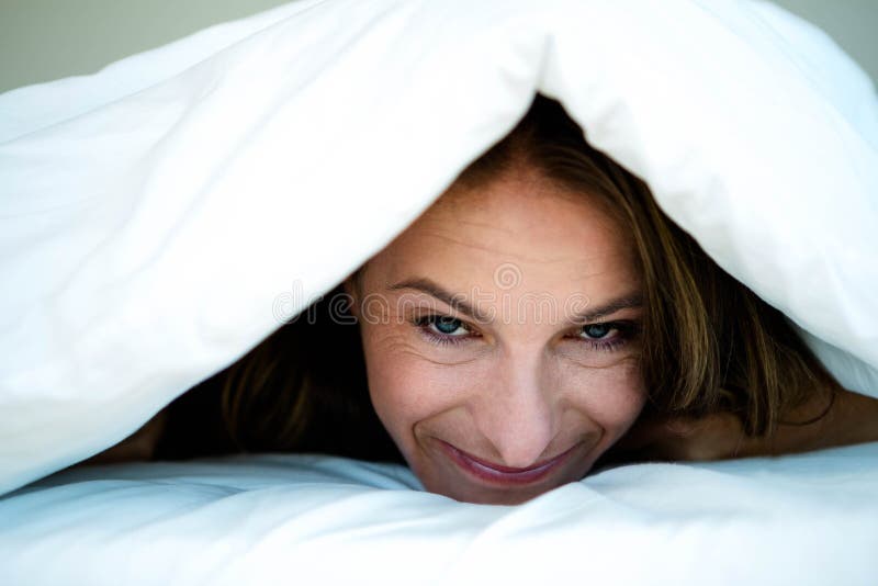 Woman Peering Out Under Her Duvet Stock Photos - Free & Royalty-Free ...