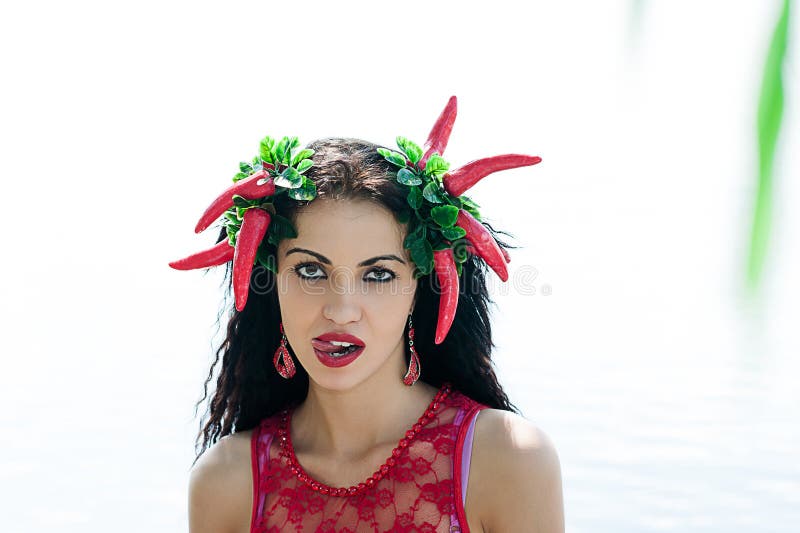 Woman with Pepper on the Head Licks His Lips Stock Photo - Image of ...