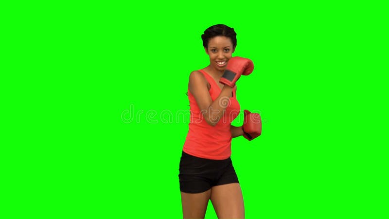 Woman Performing Air Kick on Green Screen Stock Footage - Video of ...