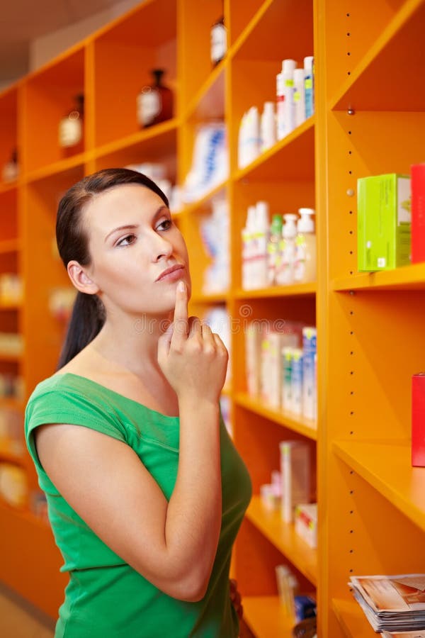 Shopper Choosing Clothes Thinking Stock Photo - Image of elegant ...