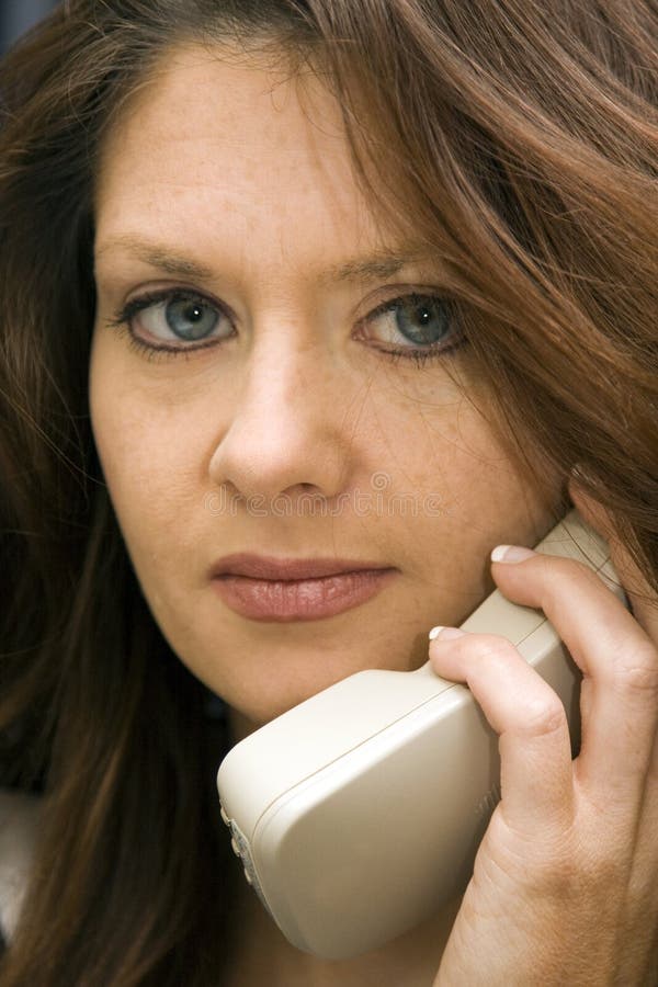 Woman on Phone with Concerned Expression Stock Photo - Image of pretty ...