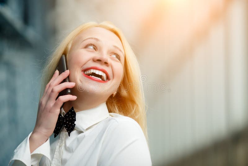 Woman with phone in hand stock photo. Image of black - 82171484