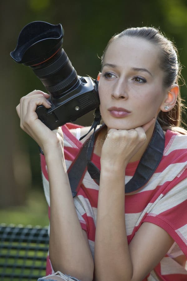 Woman with photo camera stock image. Image of holding - 10837789
