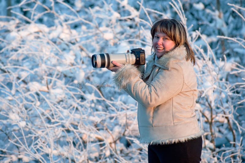 Woman with photo camera stock photo. Image of camera - 12742800