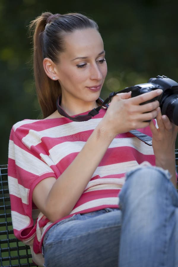 Woman Photographer Checking Pictures Stock Image - Image of female ...
