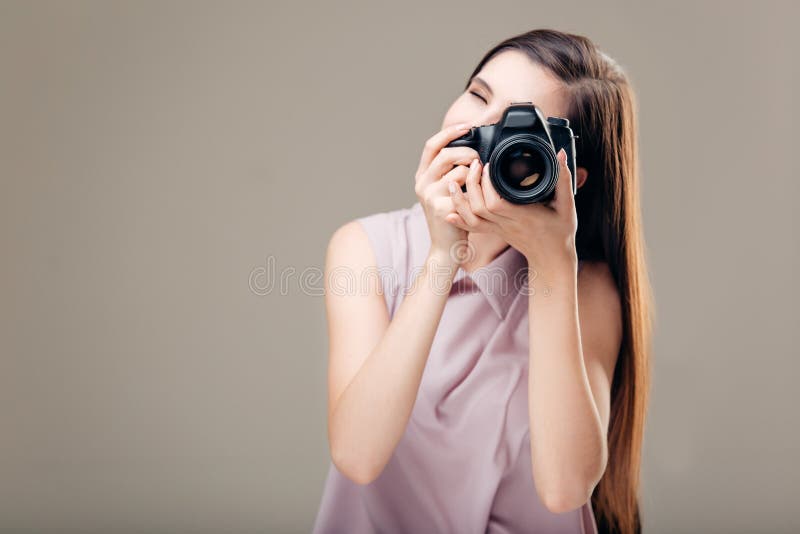 Woman Photographer Is Taking Images With Dslr Camera Stock Image