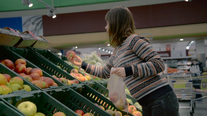 Woman Selecting Red Apple In Grocery Store Stock Video - Video of apple ...