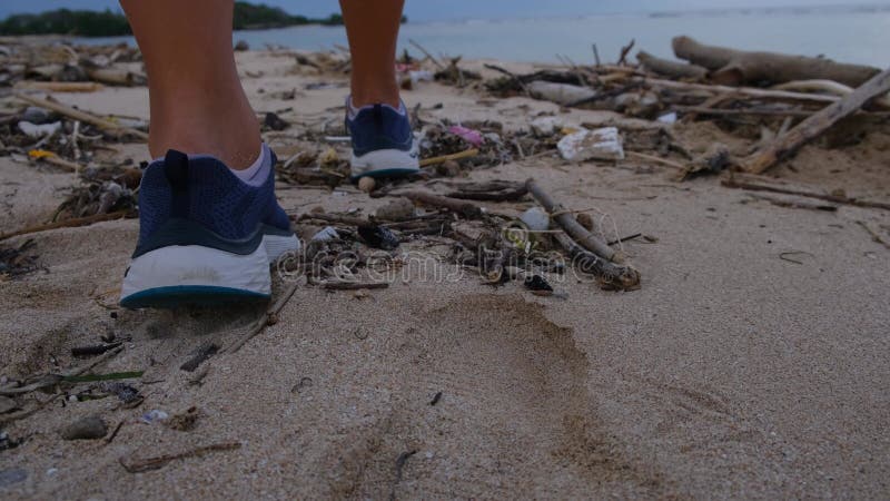 Woman Picking Plastic Bottle on Messy Beach. Stock Video - Video of ...