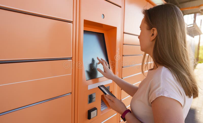 Woman picks up mail stock photo. Image of automat, locker - 219010562