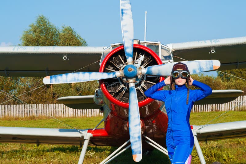 Woman Pilot in Helmet Standing with Airplane Outdoors Stock Image ...